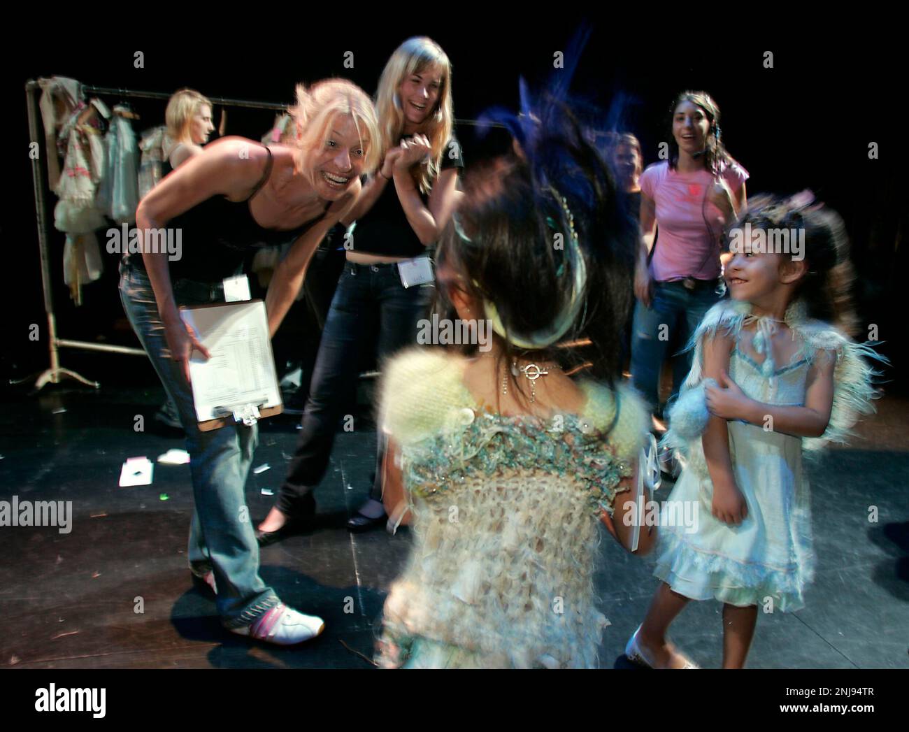 FASHWEEK04B 115 LH.JPG Choreographer Tina Spangler talking with five ...