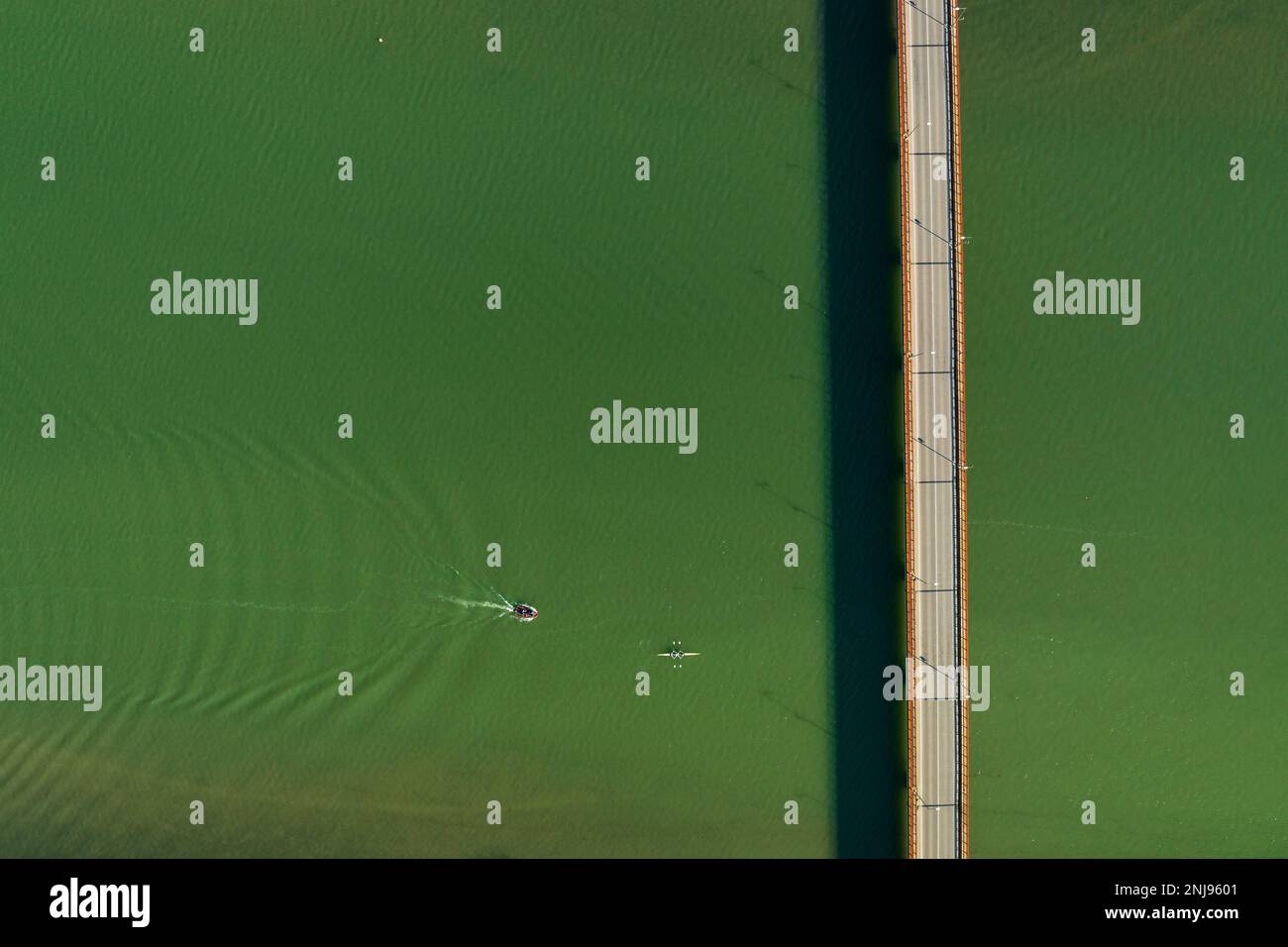 Aerial view of the bridge over the Segre river in Mequinenza and kayaks ...