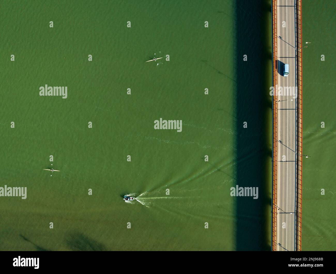 Aerial view of the bridge over the Segre river in Mequinenza and kayaks ...