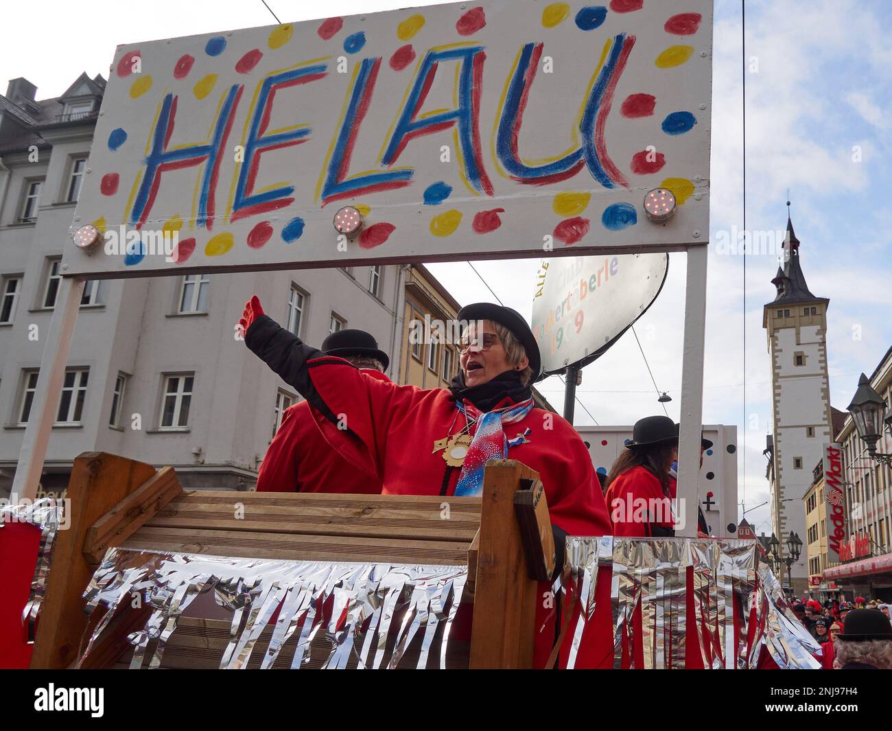 Woman standin and crowd hi-res stock photography and images - Alamy