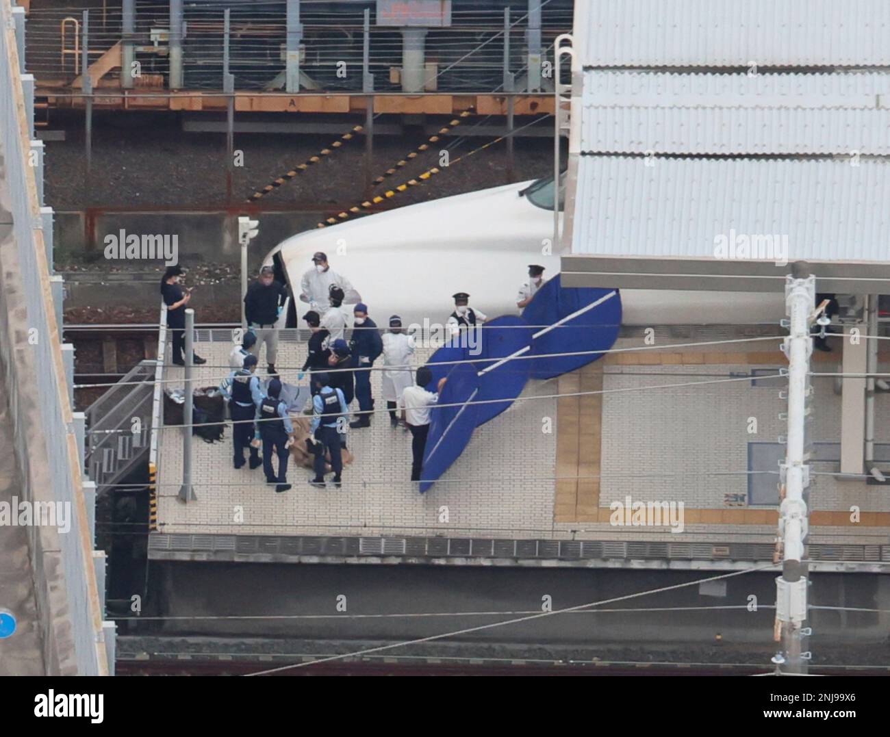 An aerial photo shows a Shinkansen Bullet Train believed to have hit a ...