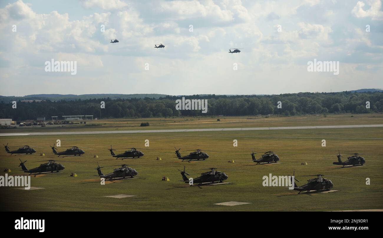 Three U.S. Army UH-60 Black Hawks land at the Grayling Army Airfield ...