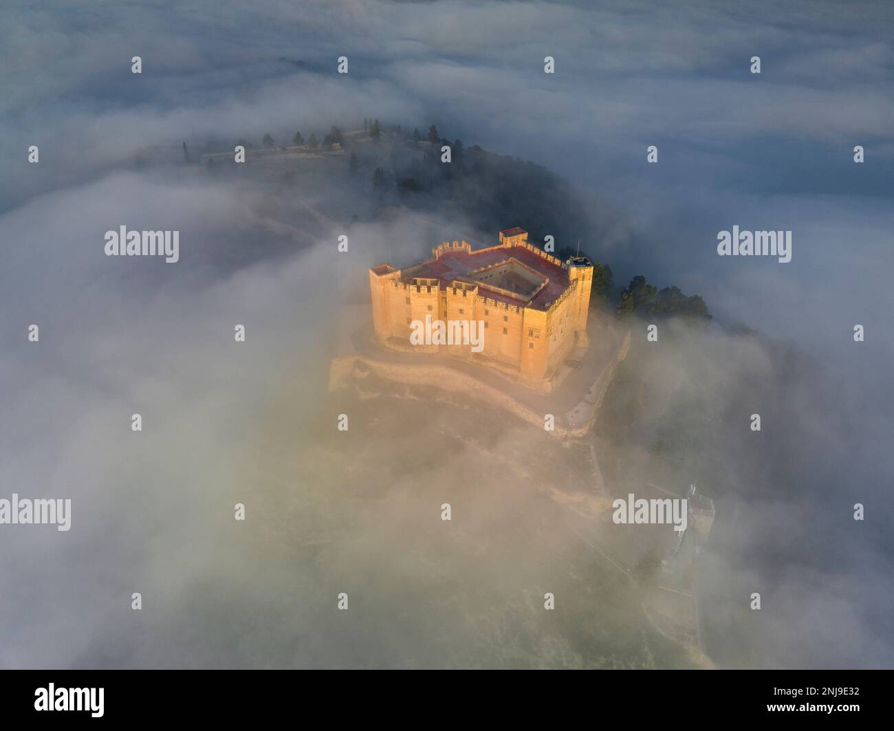 Aerial view of the castle of Mequinenza standing out from a sea of ...