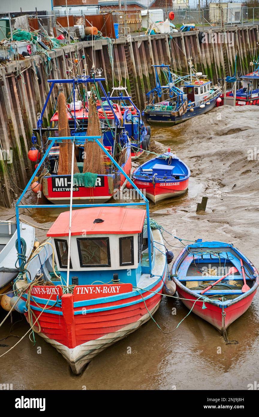 Red and blue inshore fishing boats moored at Jubilee Quay,Fleetwood ...