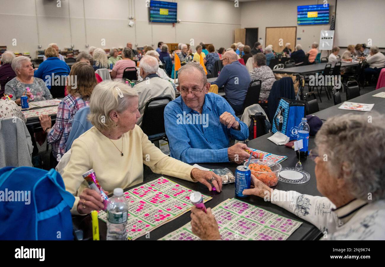 Ted Marsh, center, jokes with Anne Deletetsky Monday, Sept. 19, 2022 as ...