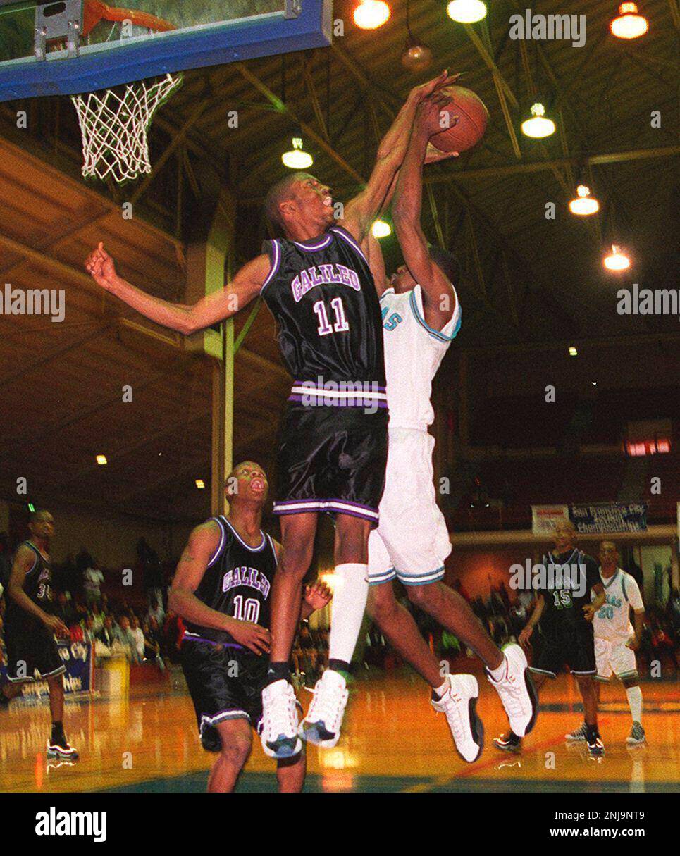 PREPS/C/07MAR97/SP/LH--Burton's center Arinze Anoruo is blocked by ...