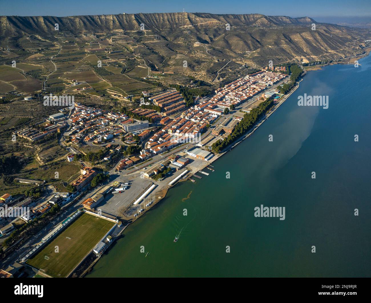 Aerial view of the new town of Mequinenza next to the Segre river (Bajo ...