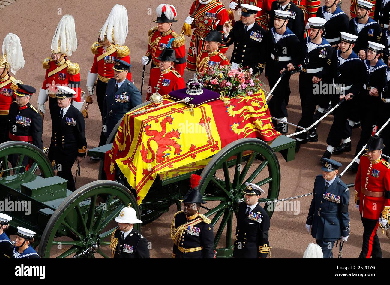 Queen Elizabeth II's funeral cortege borne on the State Gun Carriage of ...