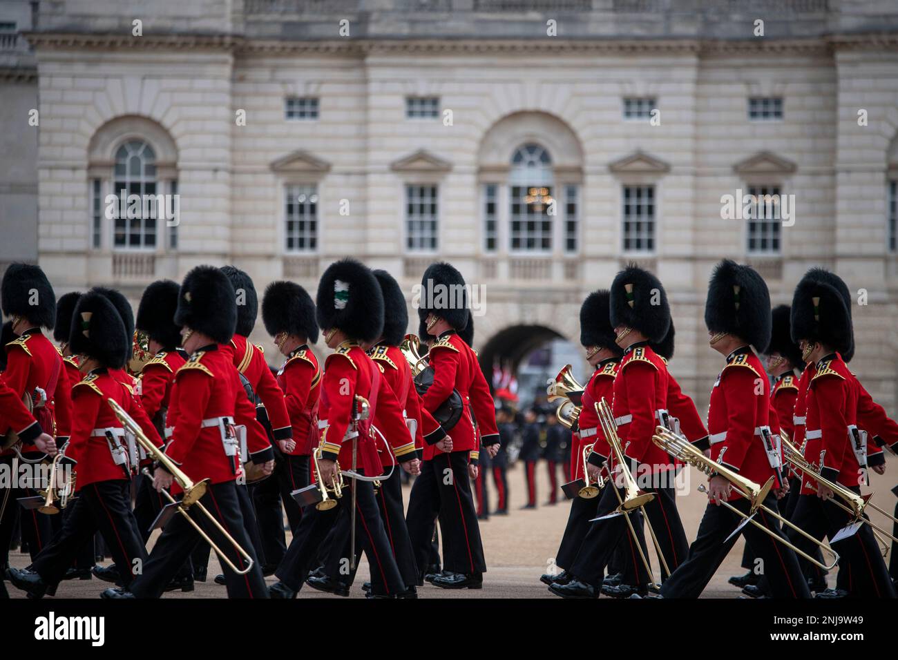Members of the British Royal Guard passing through Horseguards Parade ...