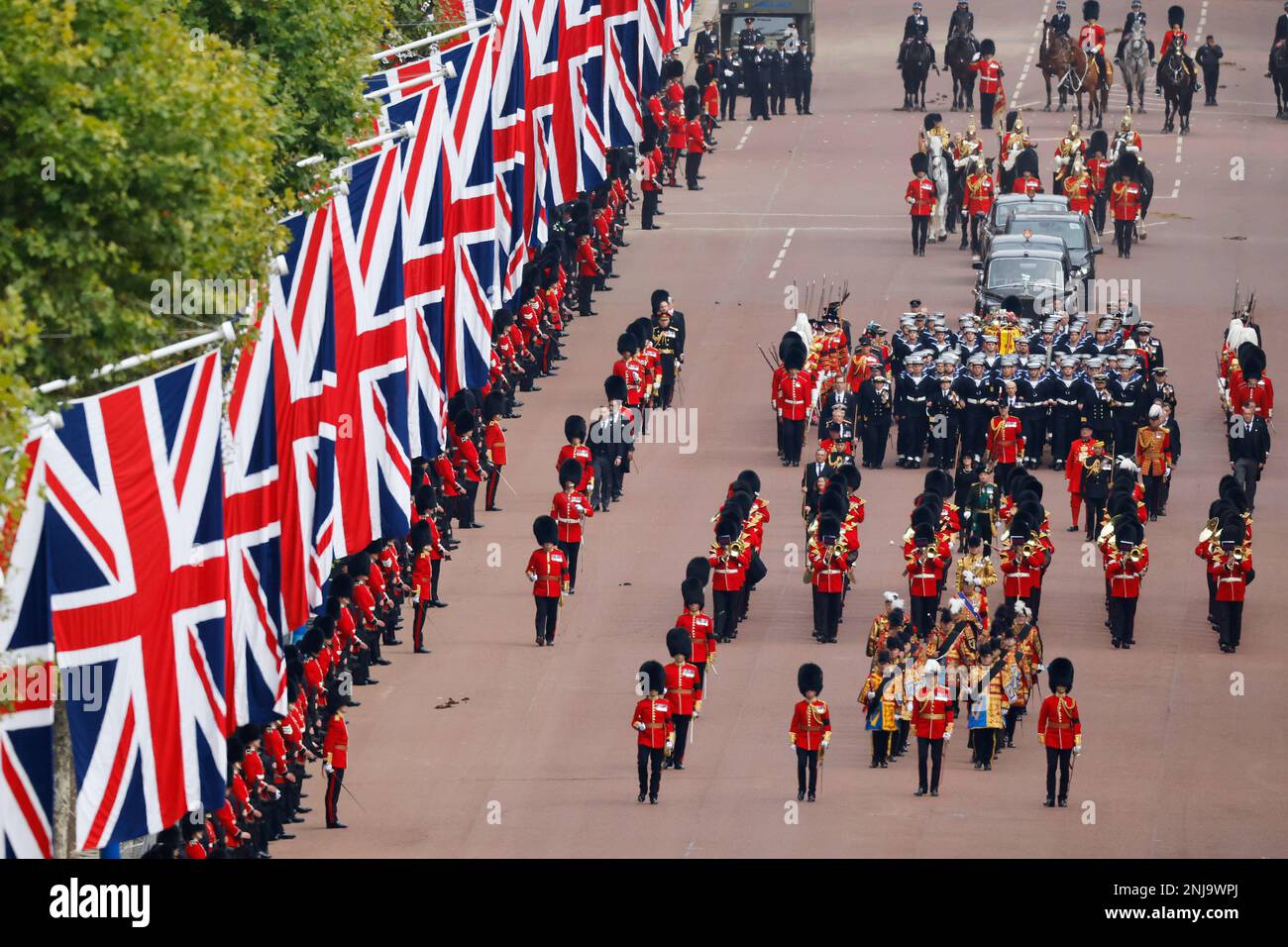 Queen Elizabeth II's funeral cortege borne on the State Gun Carriage of ...