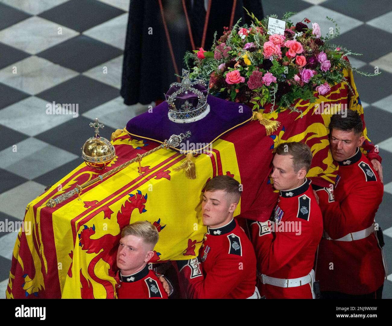 The pall bearers lead the coffin away at the state funeral of Queen ...