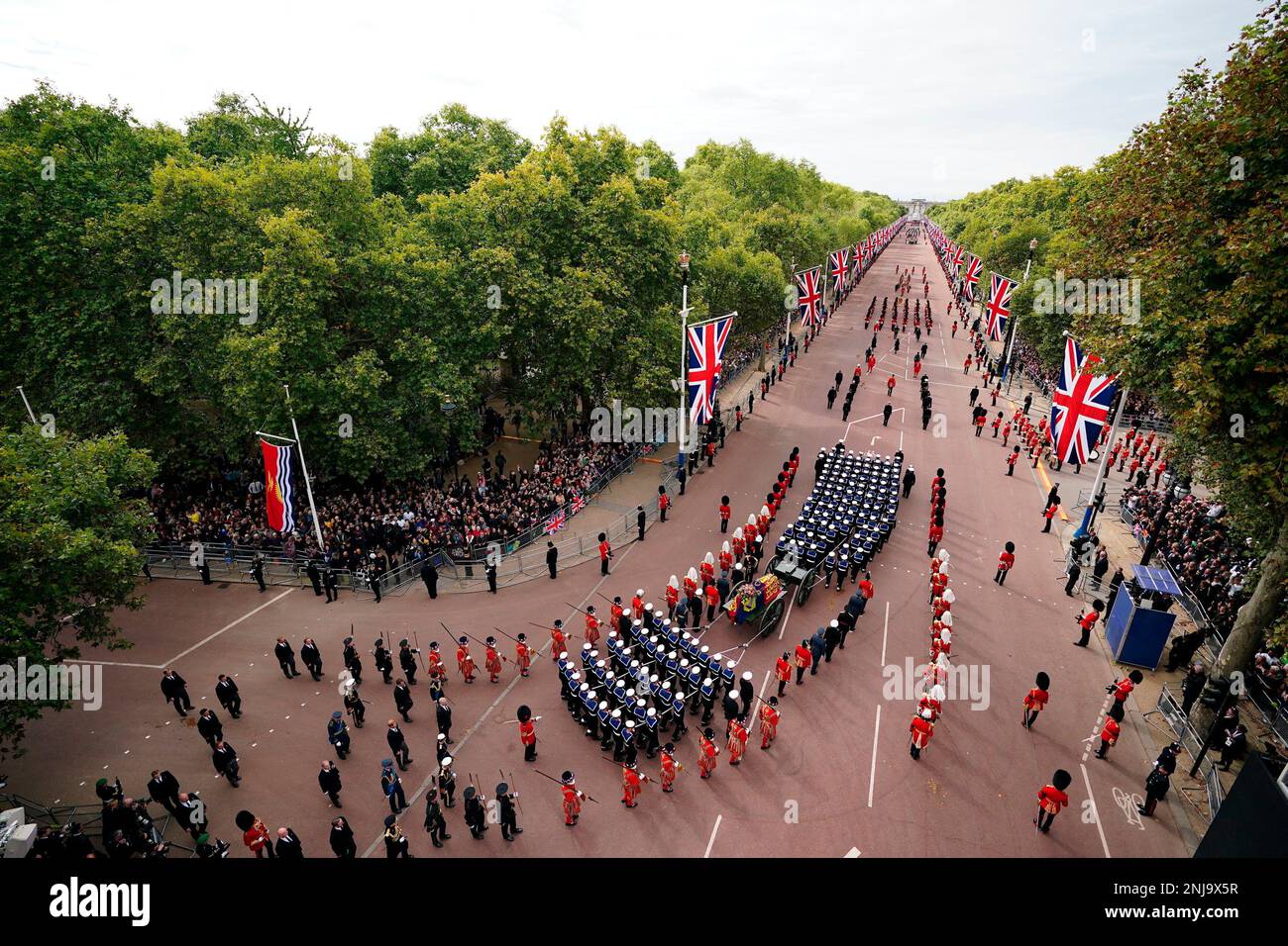 Queen Elizabeth II's funeral cortege borne on the State Gun Carriage of ...