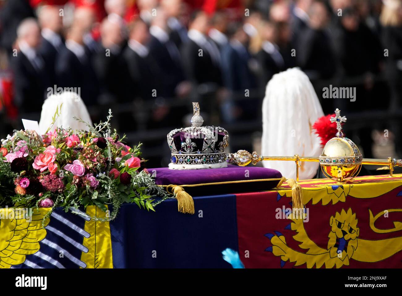 The coffin of Queen Elizabeth II draped in the Royal Standard with the ...