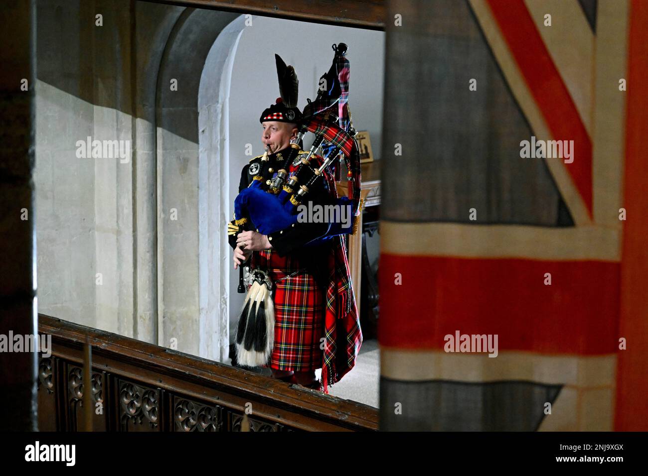 Pipe Major Paul Burns of the Royal Regiment of Scotland helps to close ...
