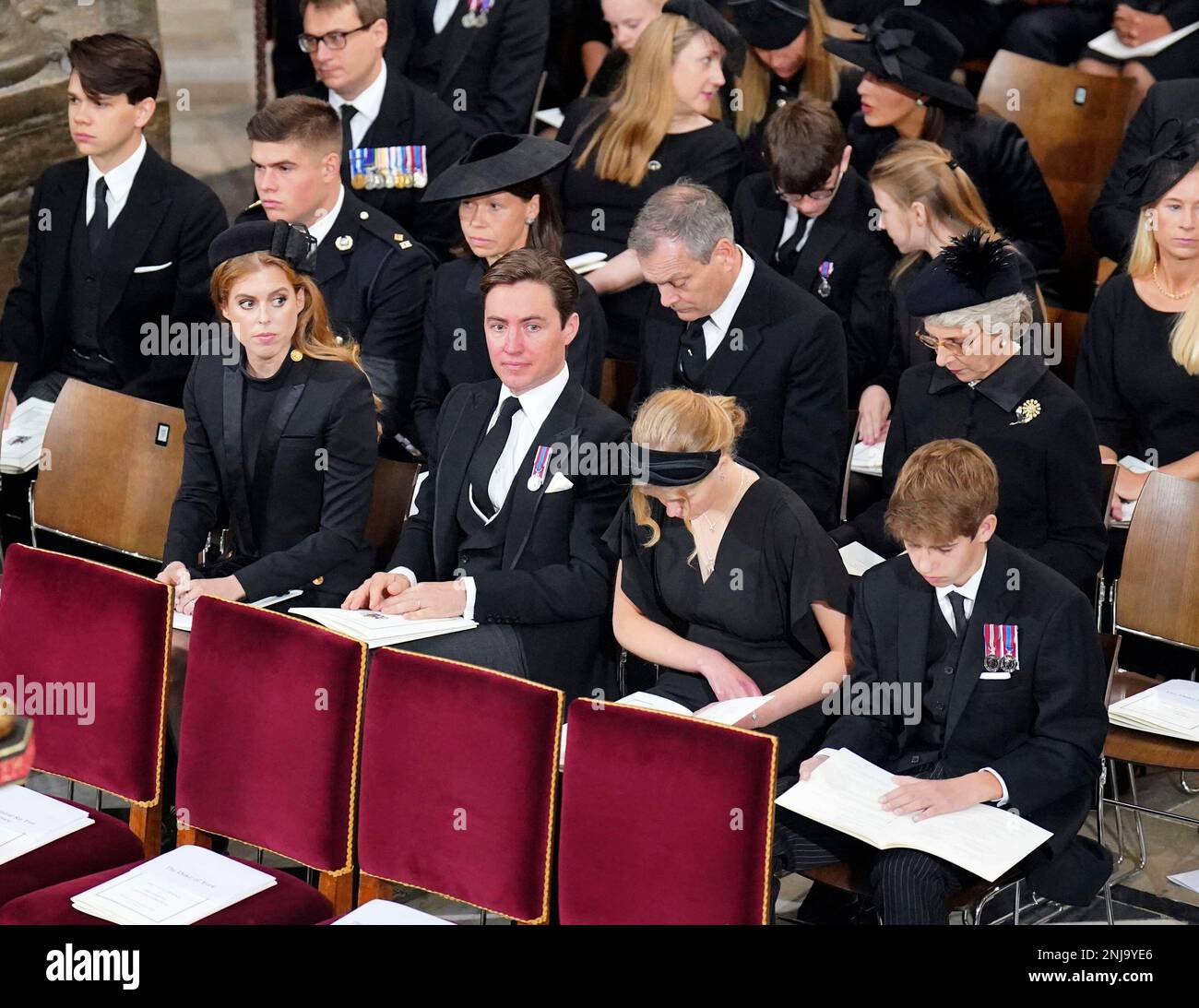 Members of the royal family, front row, from left, Princess Beatrice ...