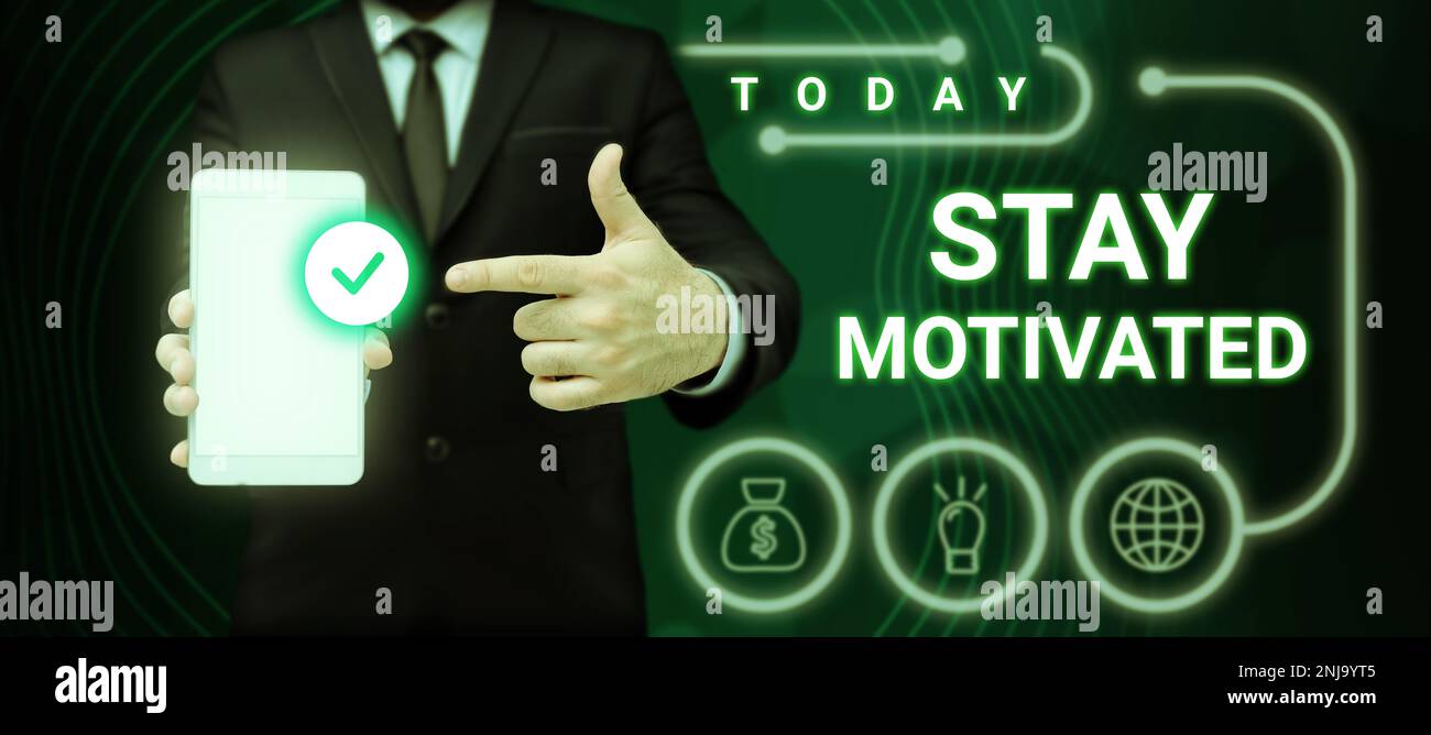 Hand writing sign Stay Motivated. Word Written on Reward yourself every ...