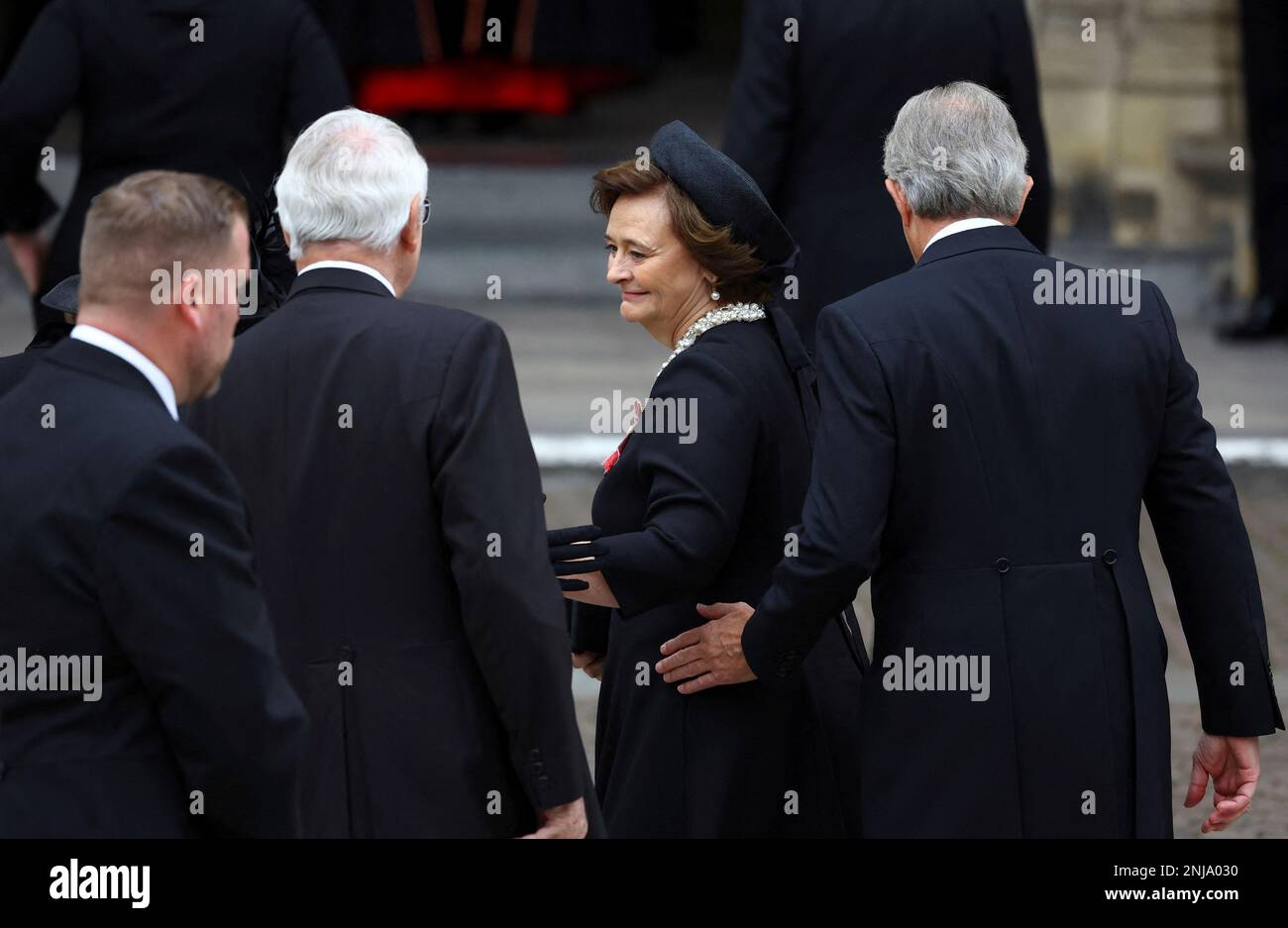 Former British Prime Minister Tony Blair and his wife Cherie walk ...