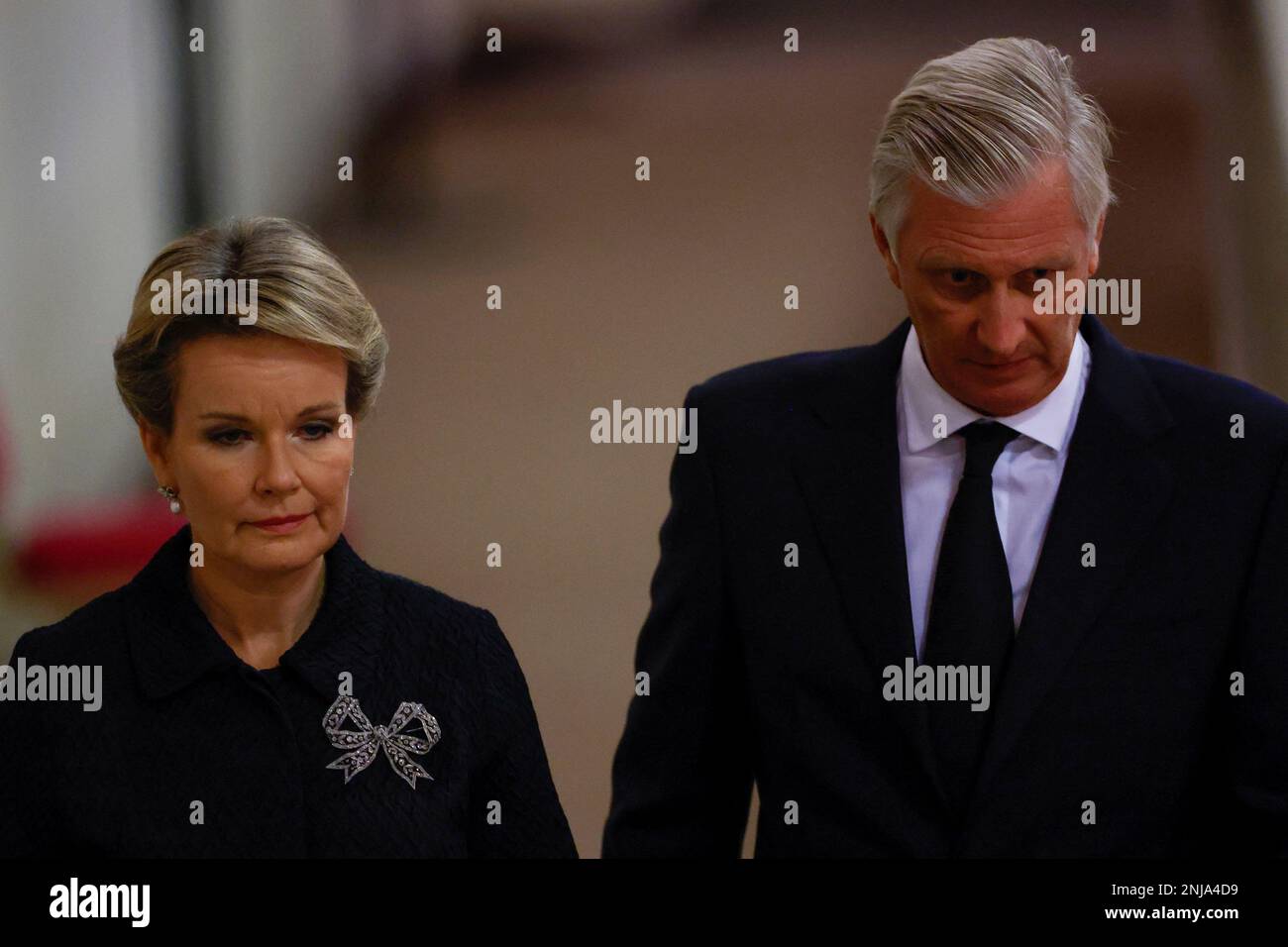 King Philippe and Queen Mathilde of Belgium pay their respects to the ...