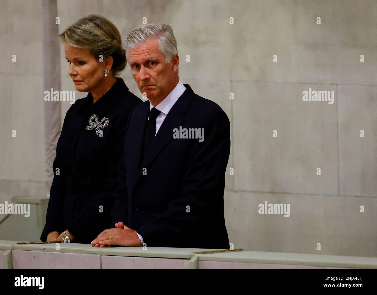 King Philippe and Queen Mathilde of Belgium pay their respects to the ...