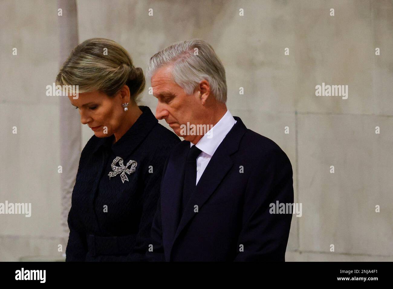 King Philippe and Queen Mathilde of Belgium pay their respects to the ...