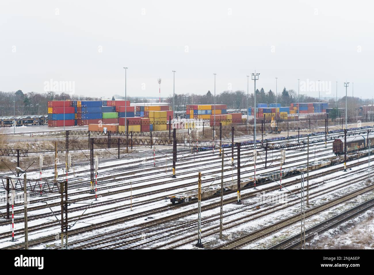 Freight unloading and loading railway station. There are empty wagons ...