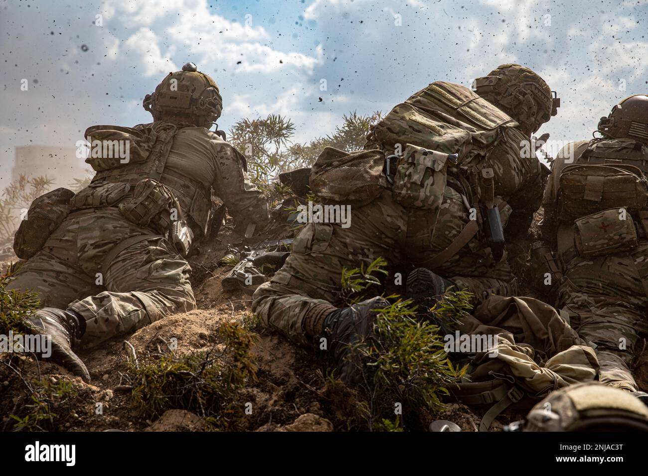 Operators from the 20th Special Forces Group provide fire support to an ...