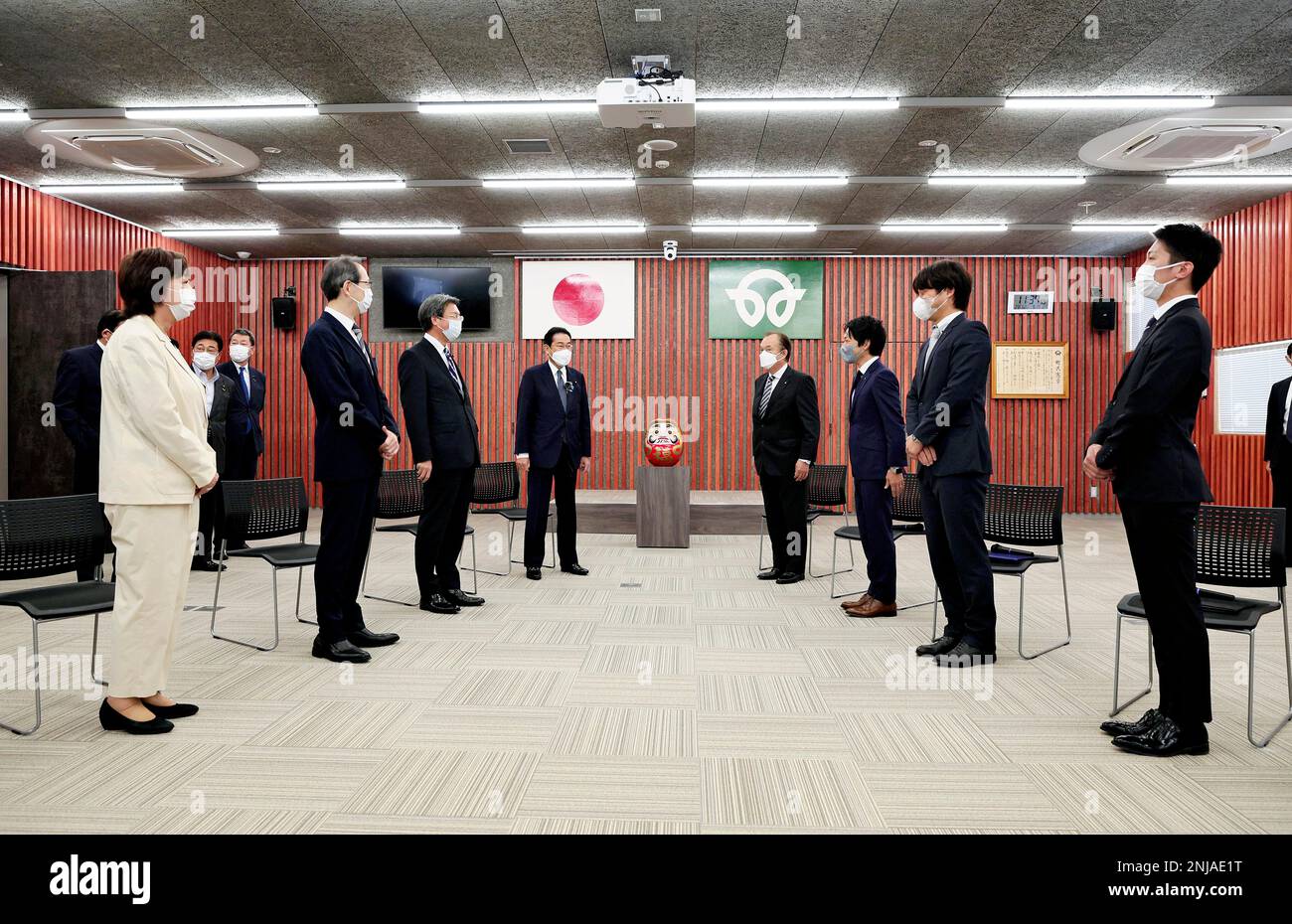 Prime Minister Fumio Ksihida meets Shiro Izawa, a Futaba town mayor ...