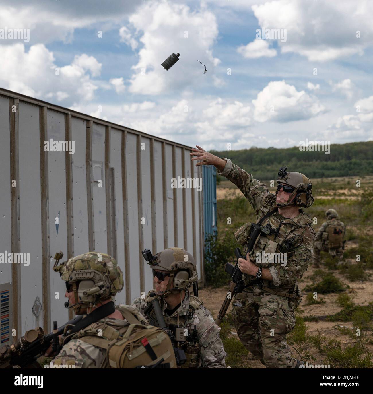 Operators from the 20th Special Forces Group conduct an aerial assault ...