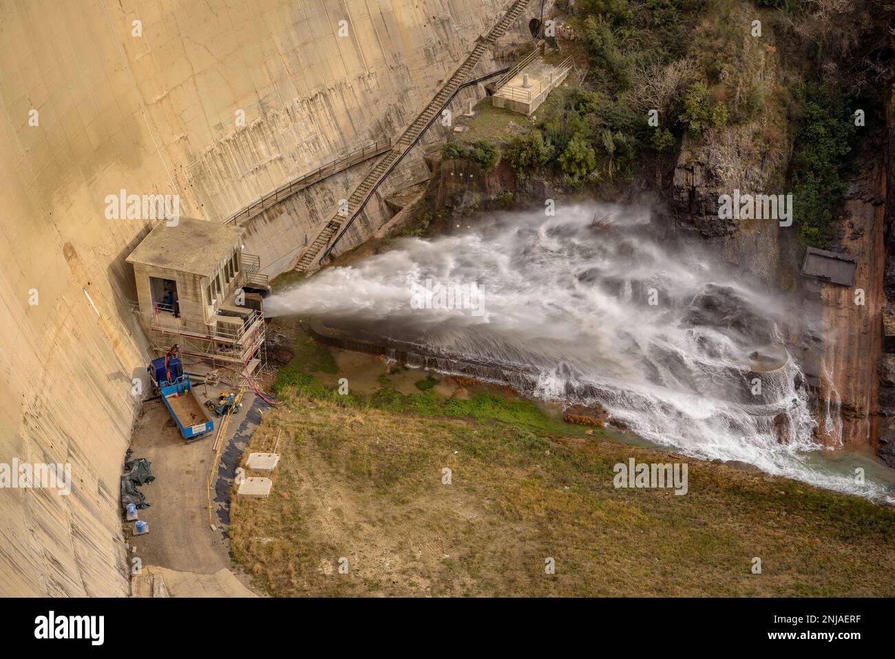 Lower spout of the dam of the Baells reservoir that lets water out into ...
