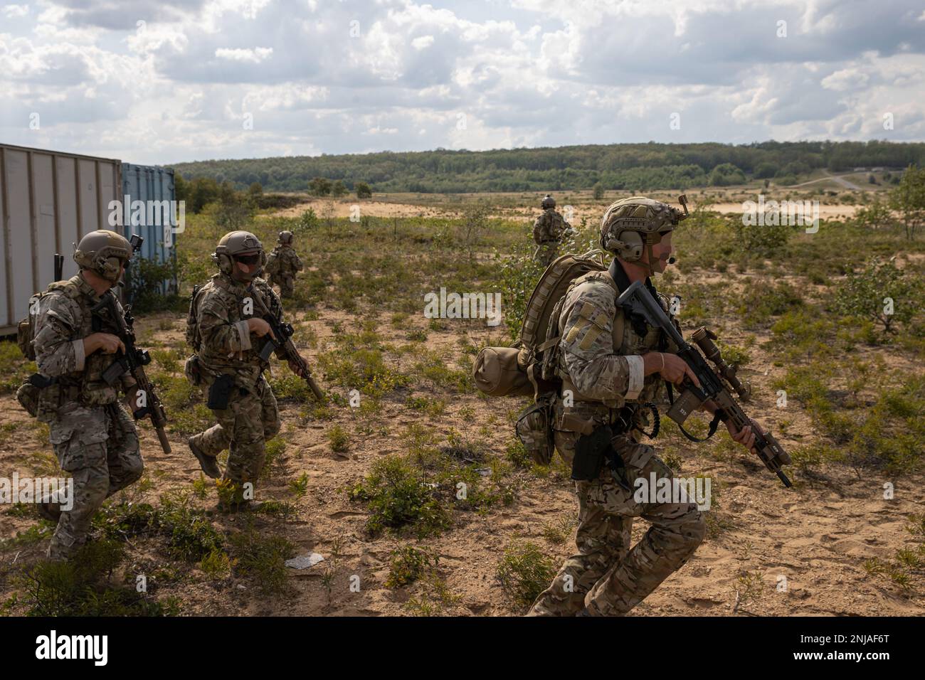 Operators from the 20th Special Forces Group conduct an aerial assault ...