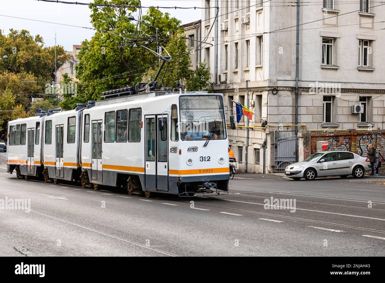 Tram in traffic. Public transport Bucharest, Romania, 2022 Stock Photo ...