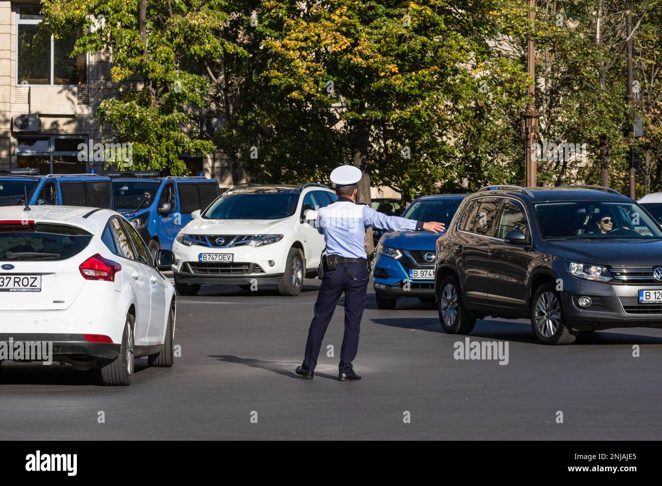 Police agent, Romanian Traffic Police (Politia Rutiera) directing ...