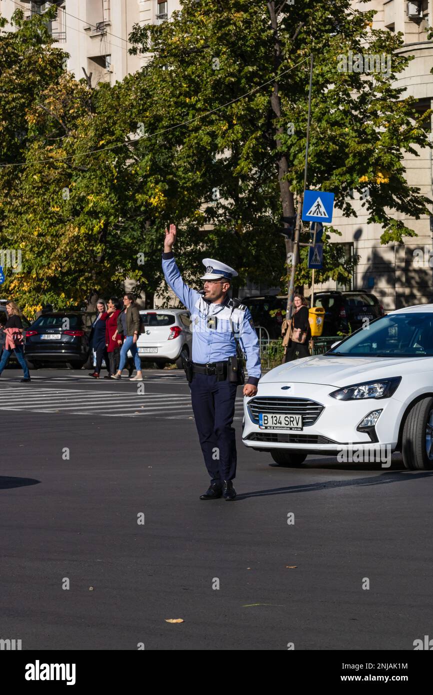 Police agent, Romanian Traffic Police (Politia Rutiera) directing ...