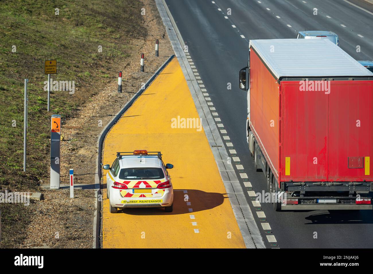 Highway maintenance car stopped on motorway in England UK Stock Photo ...