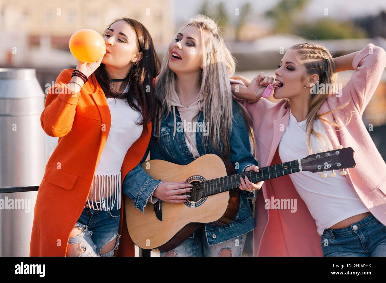 Female friendship. Creative pastime outdoors Stock Photo - Alamy