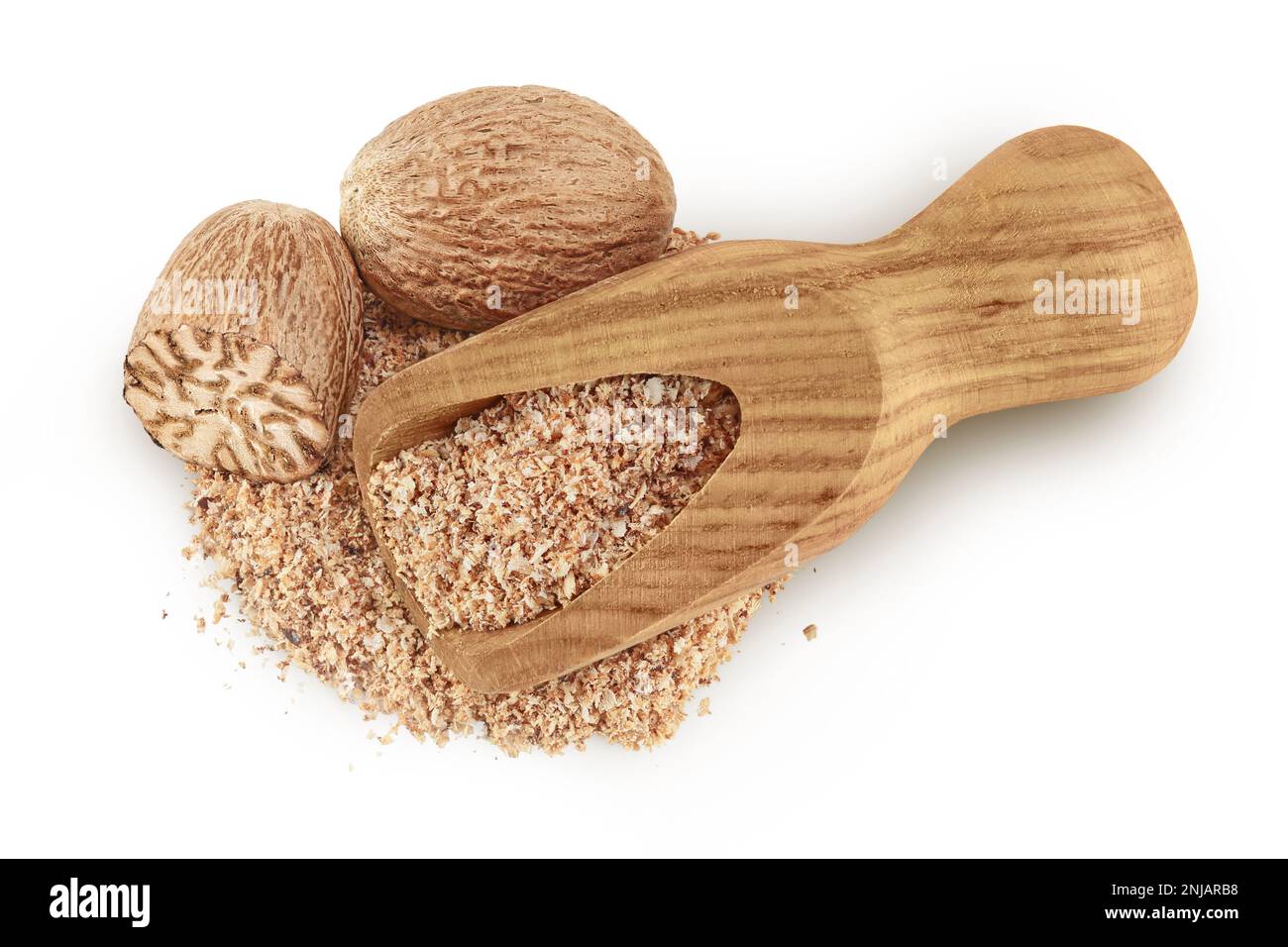 Whole and grated nutmeg in wooden scoop isolated on white background ...