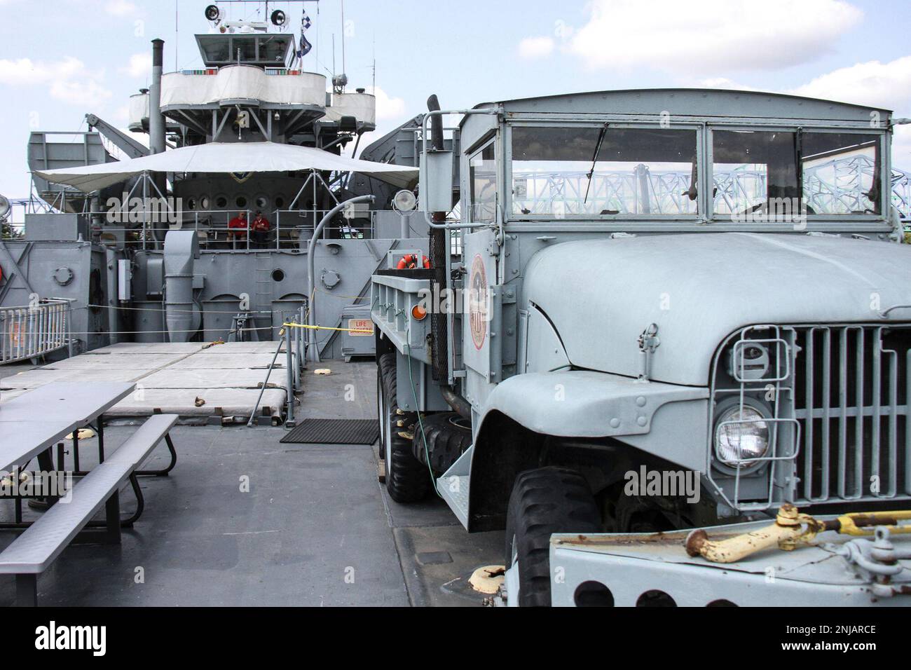 A M35 military truck sits on the deck the LST-325, a decommissioned ...