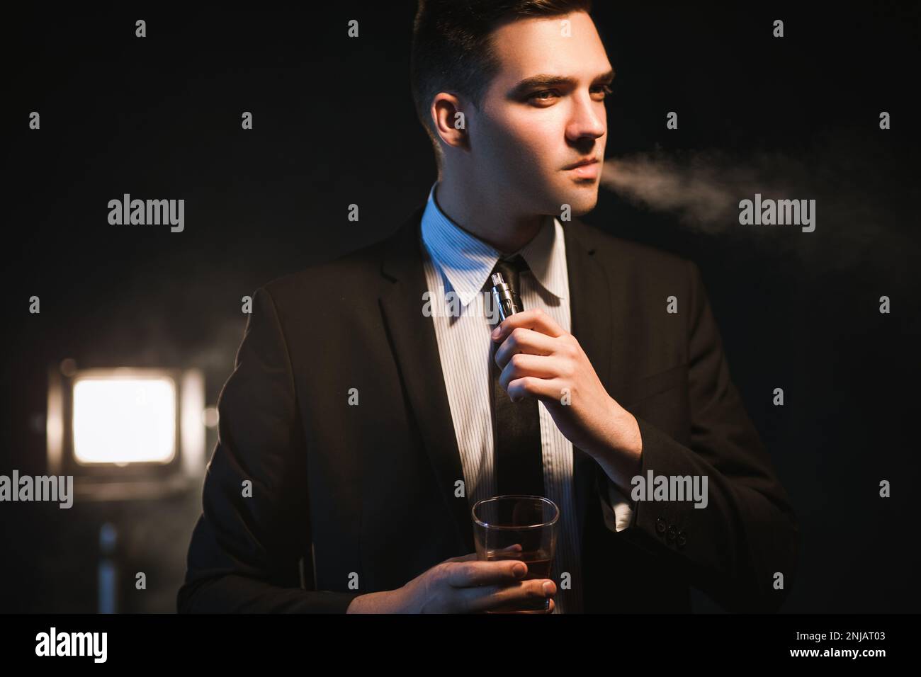 high class men luxury lifestyle alcohol smoking Stock Photo - Alamy