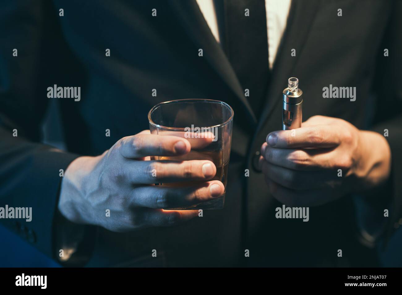 high class men luxury lifestyle alcohol smoking Stock Photo - Alamy