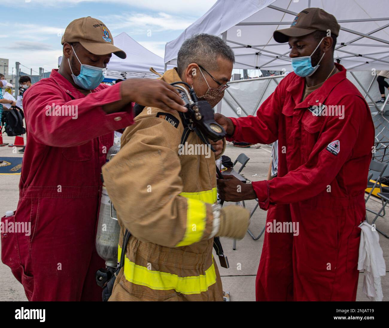Engineman Fireman Eddie Hargett and Engineman 2nd Class Dedric White ...
