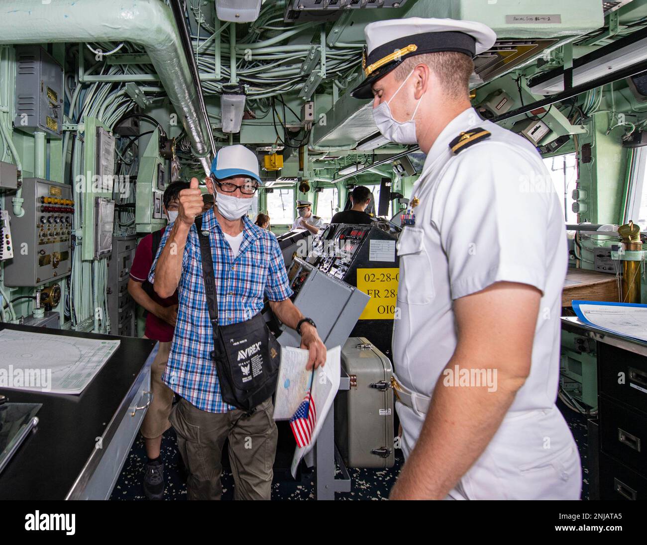 Lt. John Penner, assigned to the Avenger-class mine countermeasures ...