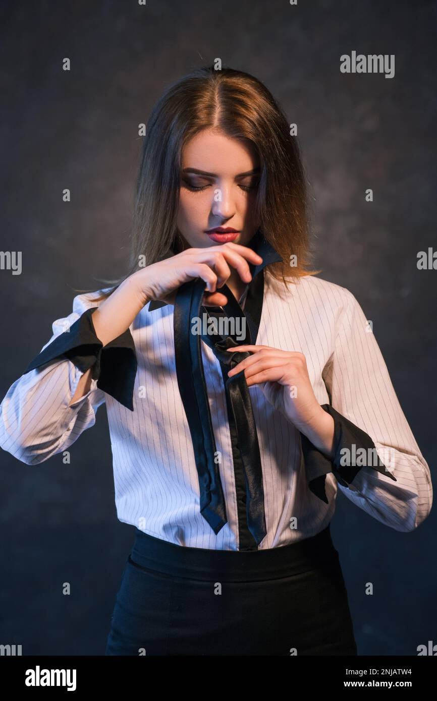 woman teach learn knot a tie helpful tutorial Stock Photo - Alamy