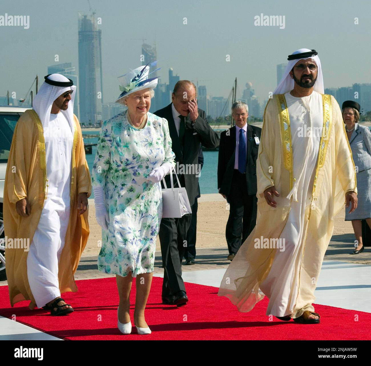 FILE - Britain's Queen Elizabeth II and Prince Philip, accompanied by ...