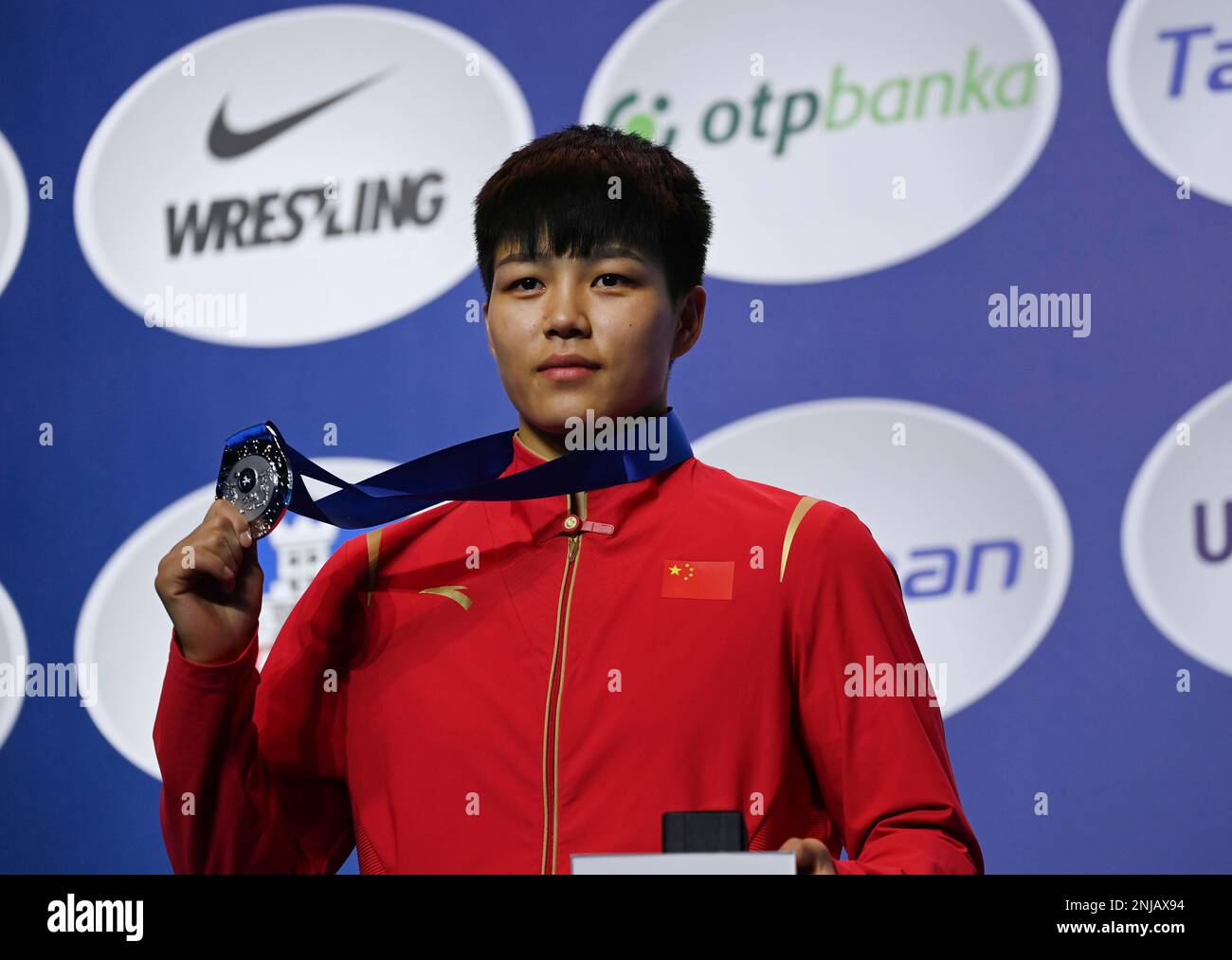 Jia LONG of China, silver, attends the award ceremony of the Women's ...