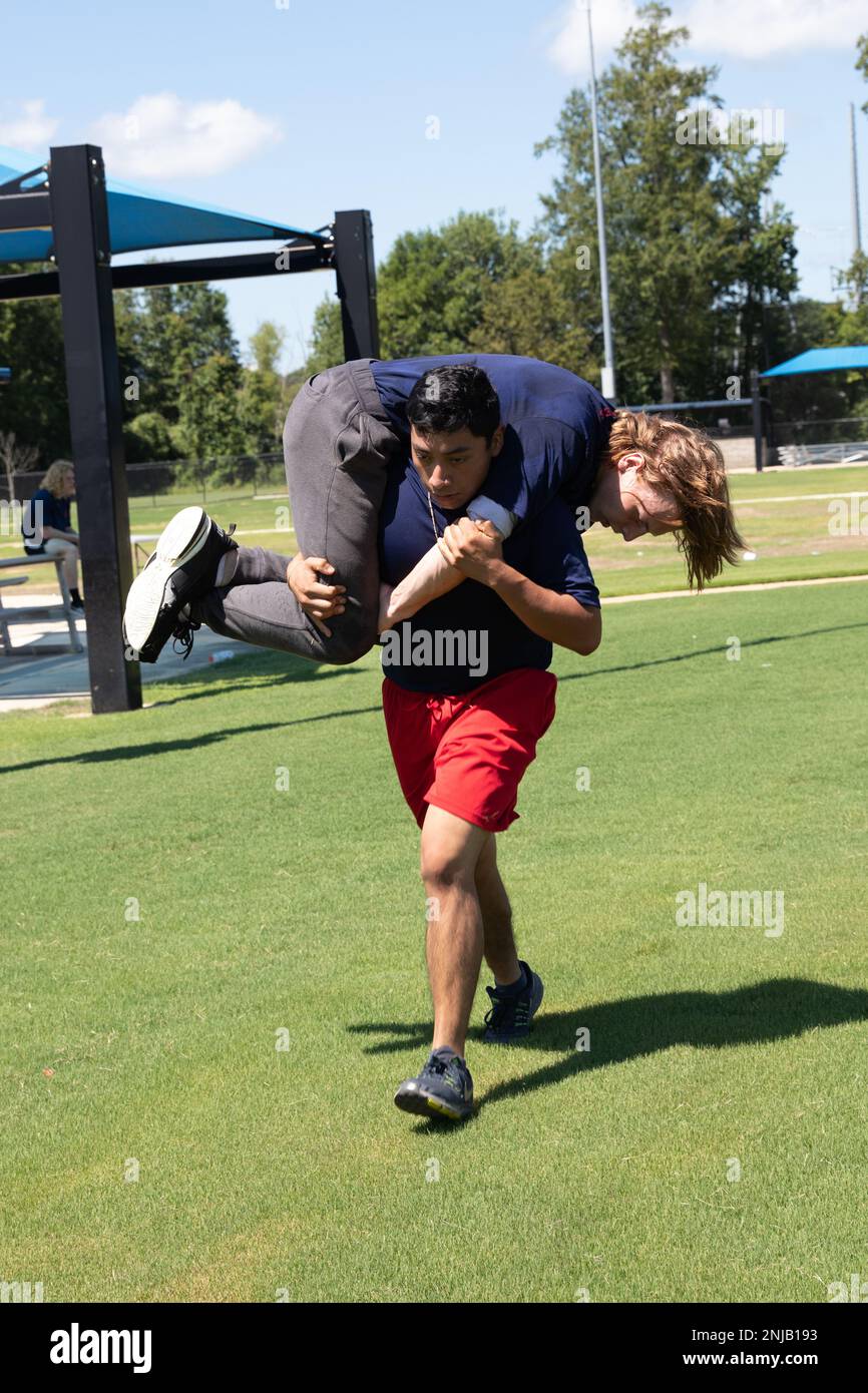 Firemans carry hi-res stock photography and images - Alamy