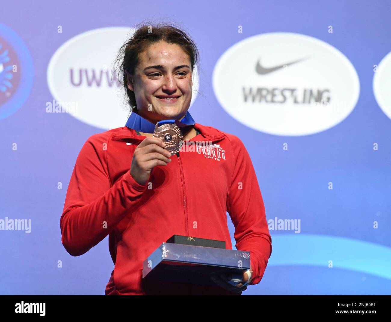 Karla Lorena GODINEZ GONZALEZ of Canada, bronze, attends an award ...