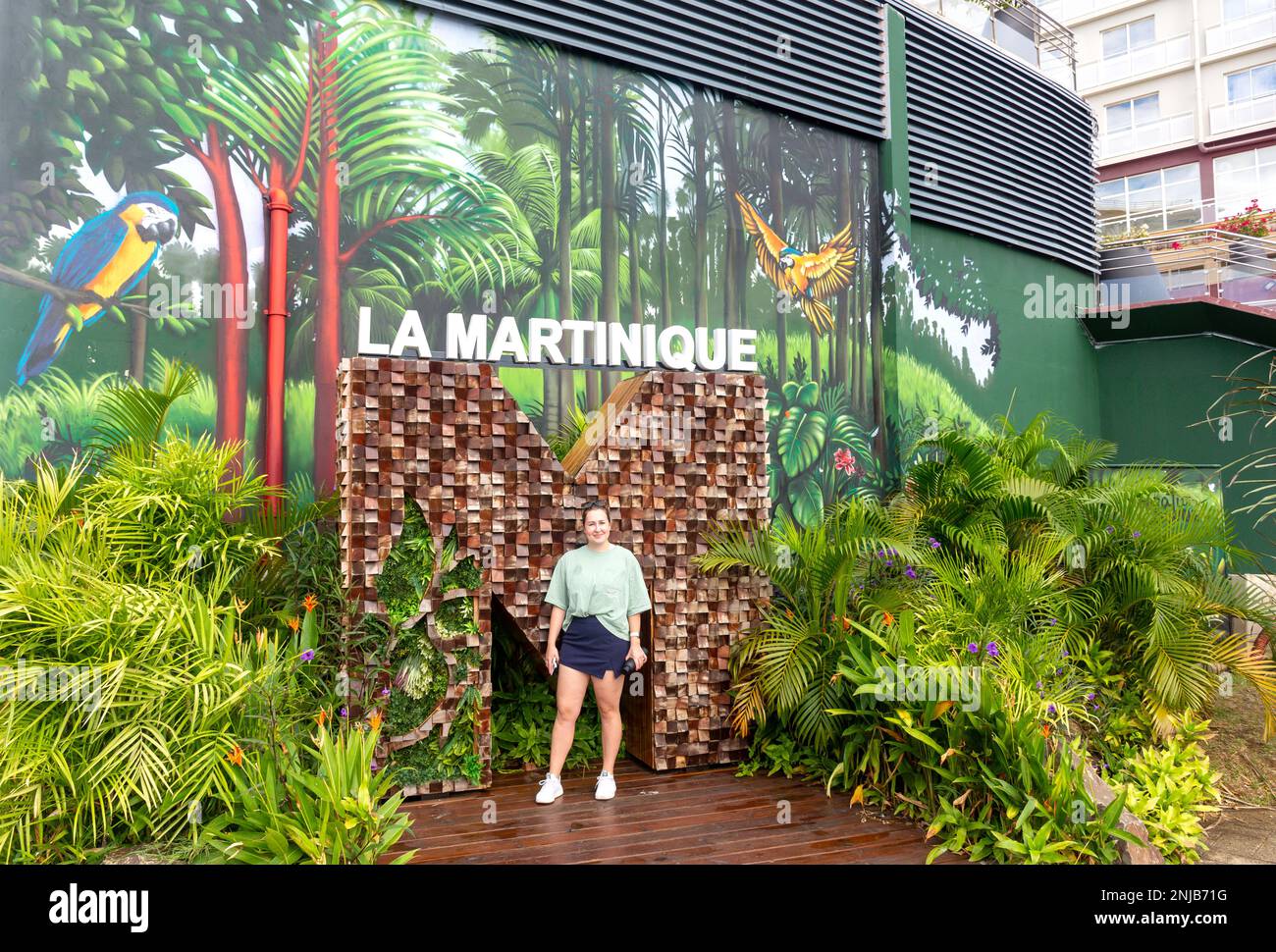 Young woman photo opportunity la martinique welcome sign at port hi-res ...