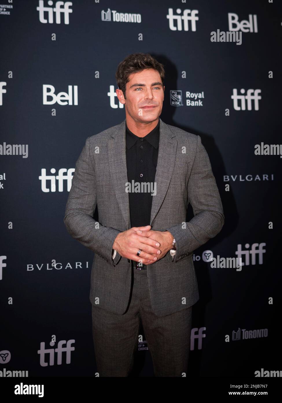 Actor Zac Efron poses for a photograph on the red carpet for the film ...