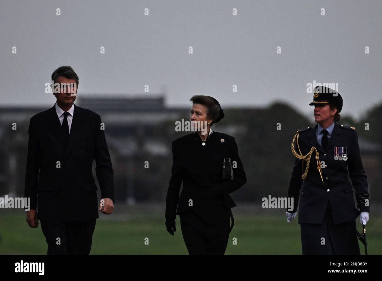 Britain's Princess Anne, center, and Vice Admiral Timothy Laurence ...