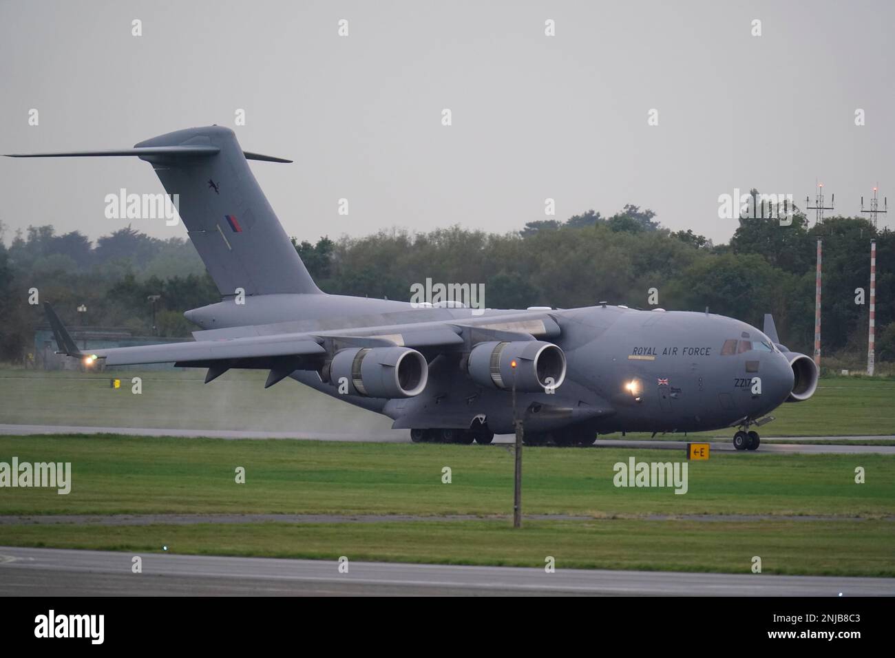 The RAF aircraft carrying the coffin of Queen Elizabeth II lands at RAF ...